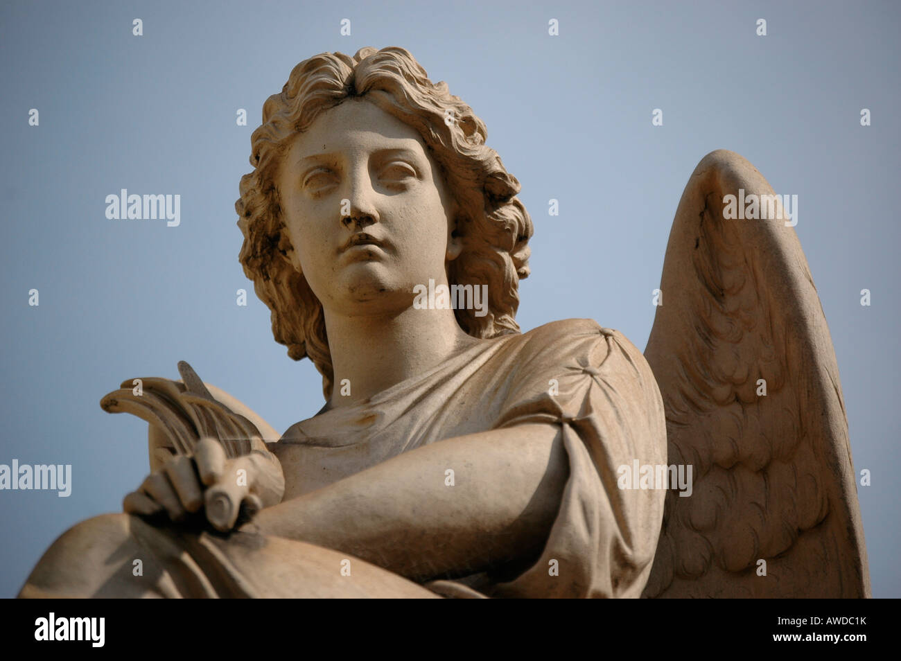 Statue of an angel on a tomb at Recoleta cementary, Buenos Aires ...