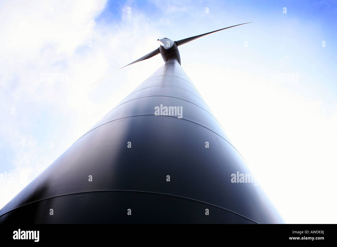 Wind turbine from below against a blue sky. Landscape Stock Photo - Alamy