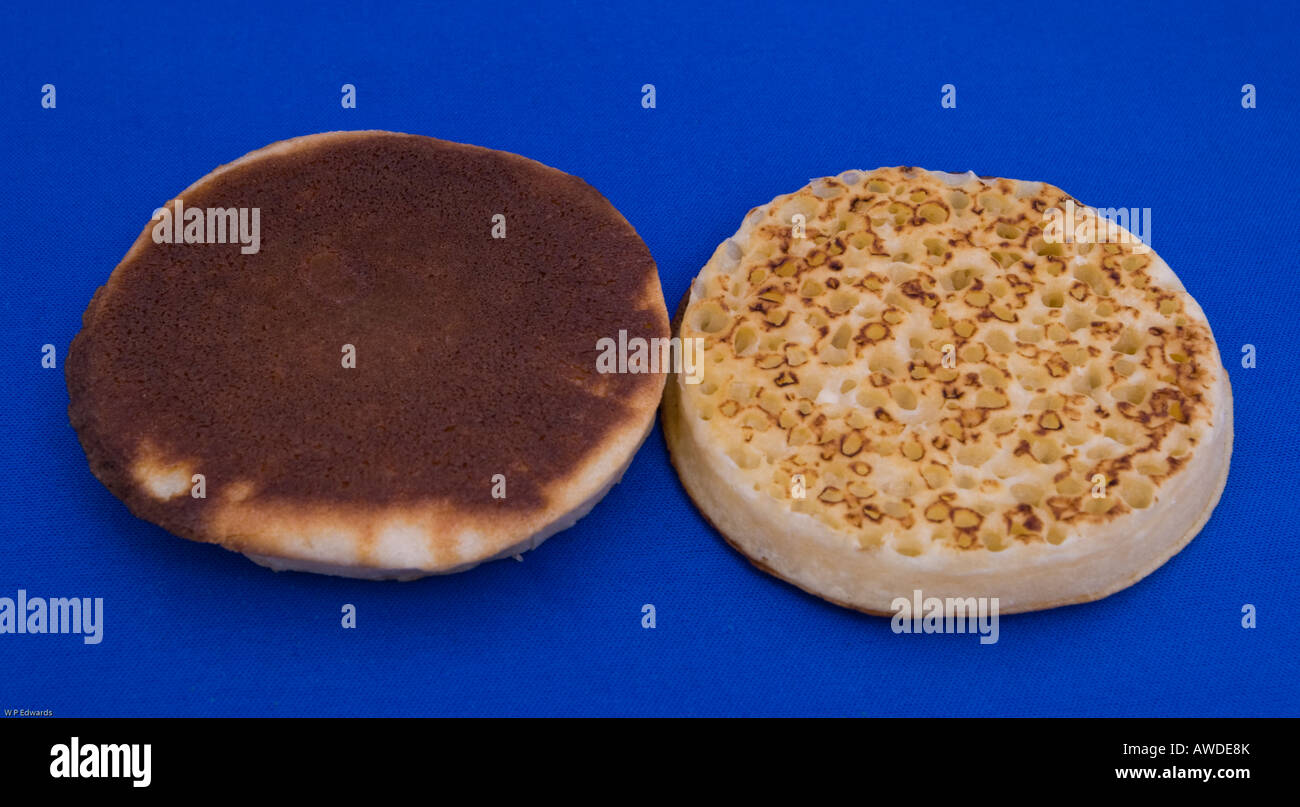 two crumpets showing top and bottom surfaces Stock Photo - Alamy