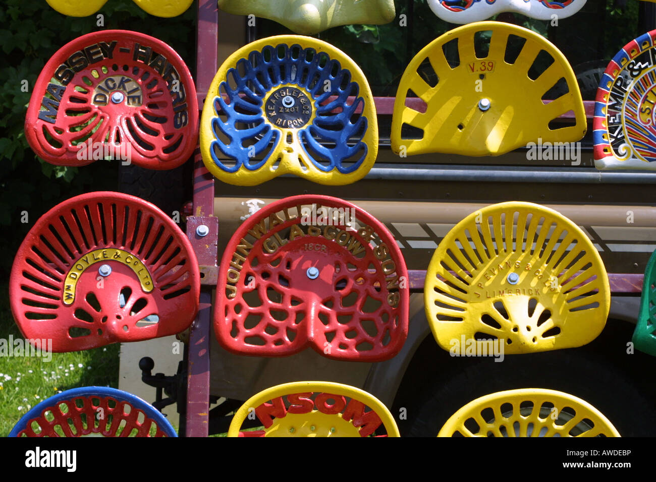 Vintage tractor seat colourful Stock Photo - Alamy