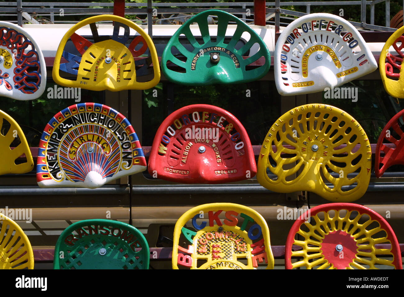 Vintage tractor seat colourful Stock Photo - Alamy