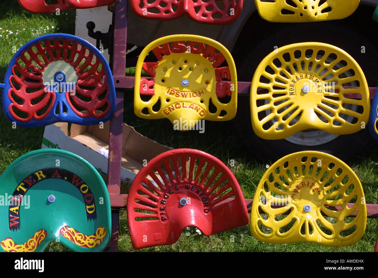 Vintage tractor seat colourful Stock Photo - Alamy