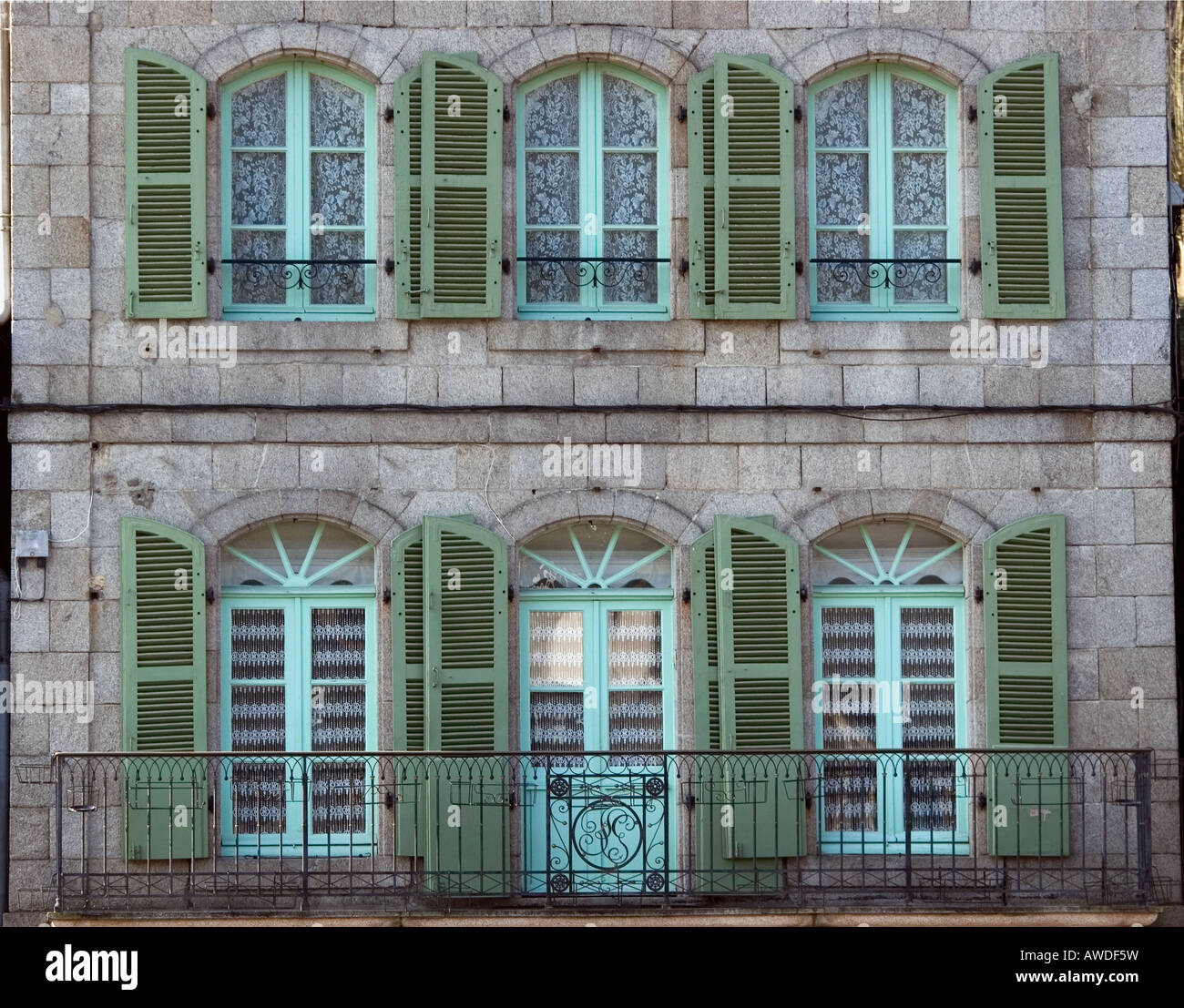 Windows and shutters painted green of house in Port Dinan, Brittany ...