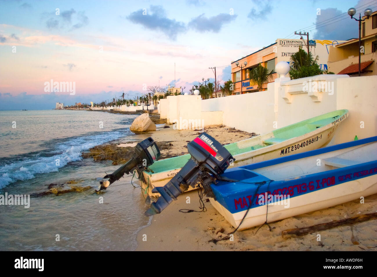 Small fishing boats at rest in Cozumel, Mexico Stock Photo - Alamy