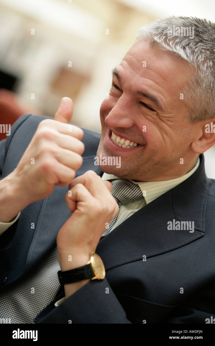 Excited man touching shoulders hi-res stock photography and images - Alamy