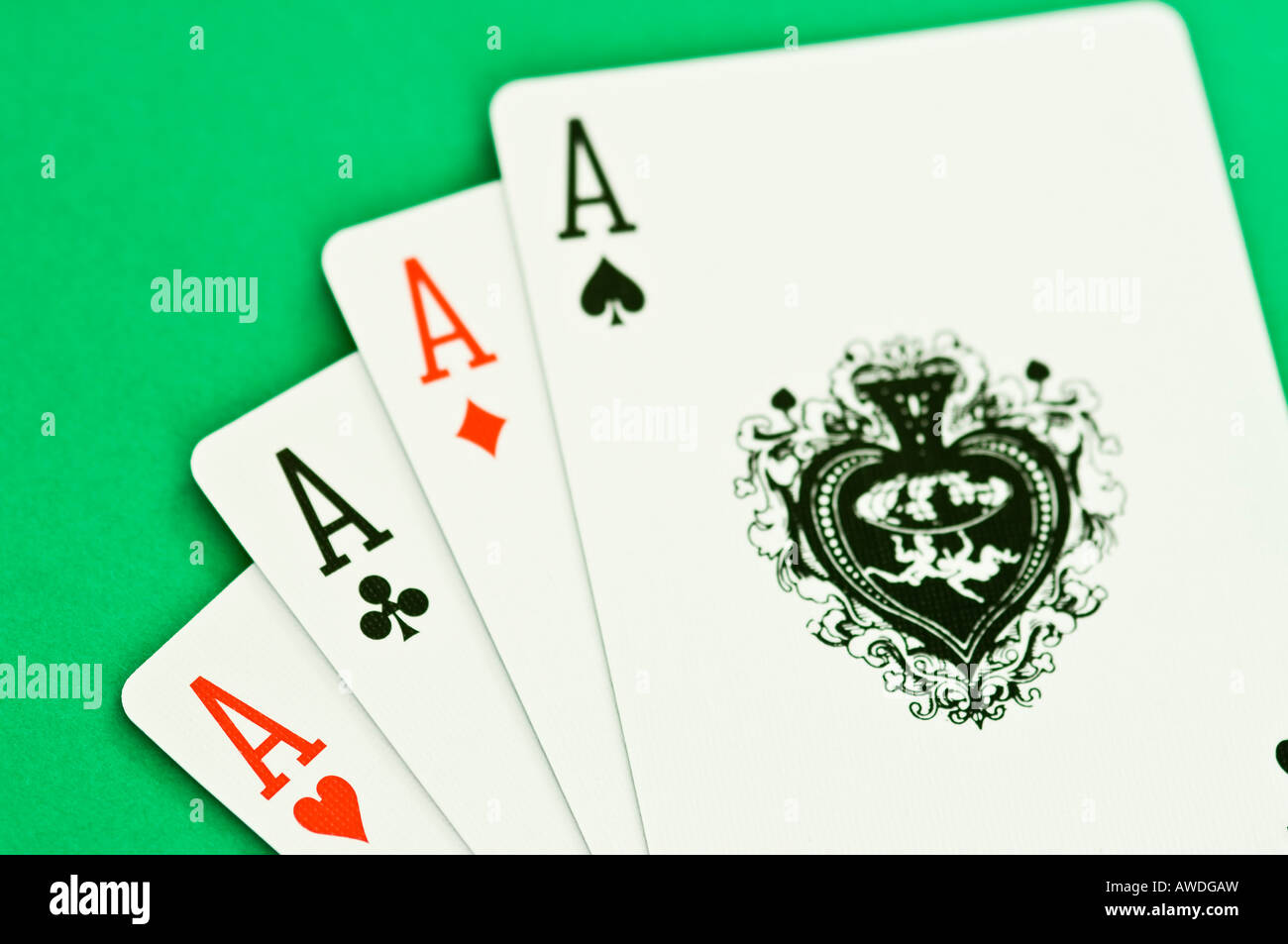Four Aces poker playing cards on the table Stock Photo - Alamy
