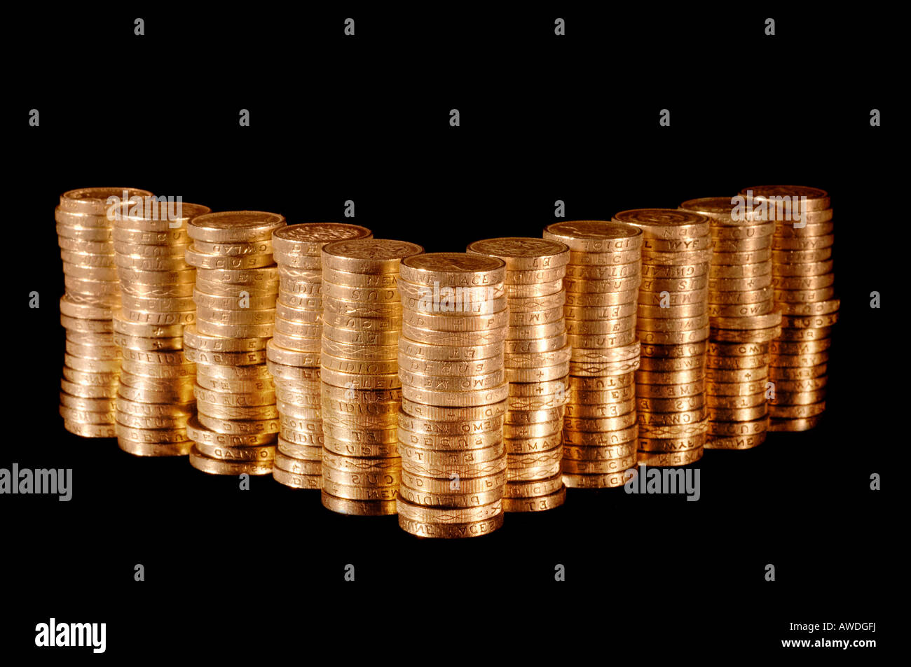 generic of shiny british pound coins balancing in the recession Stock ...