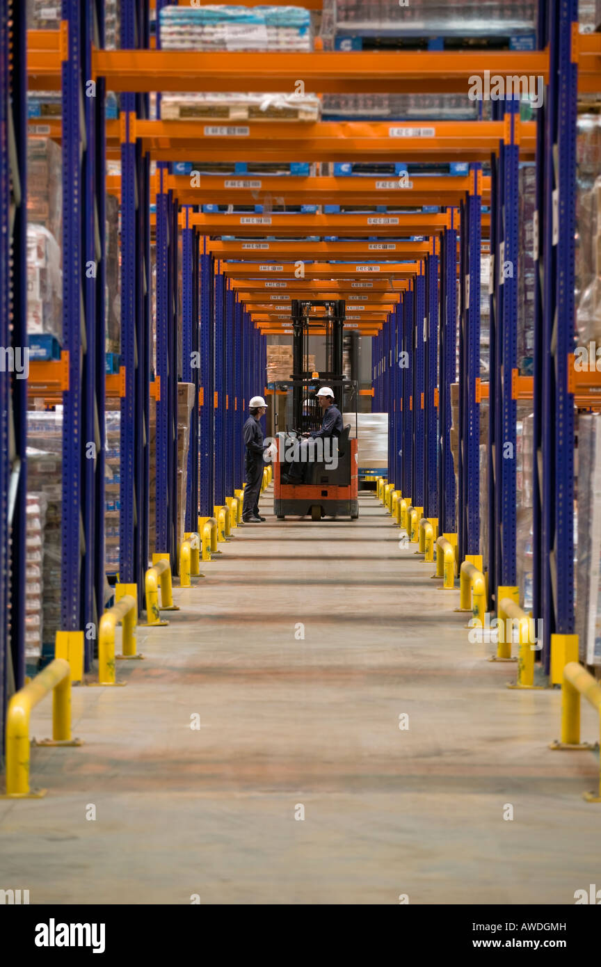 Fork lift in warehouse Stock Photo - Alamy