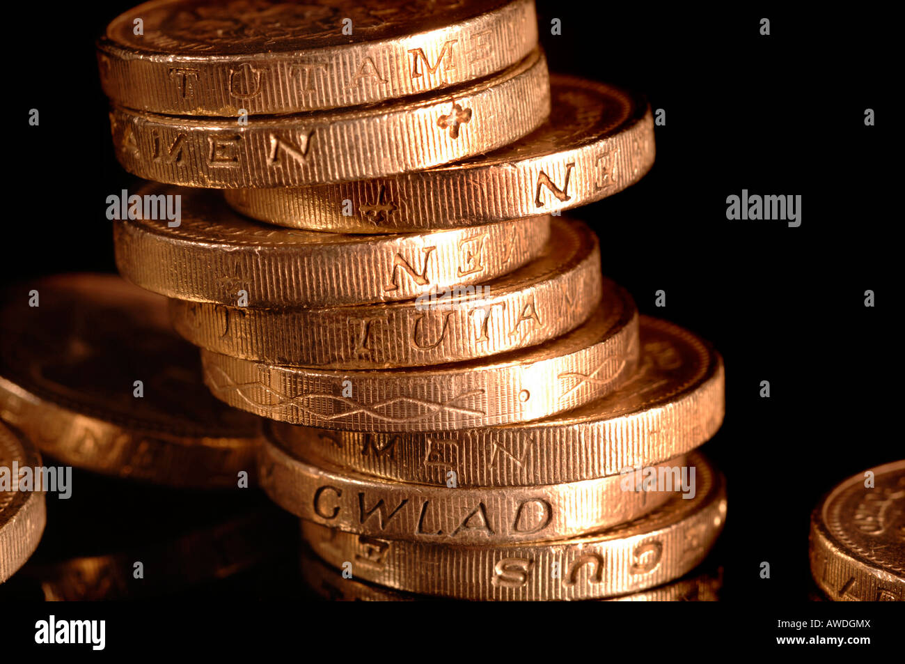 generic of shiny british pound coins balancing in the recession Stock ...