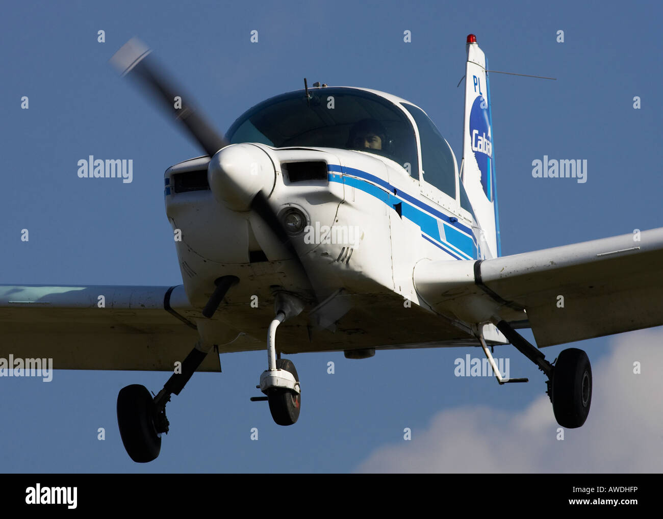 Light aircraft coming in to land Stock Photo - Alamy