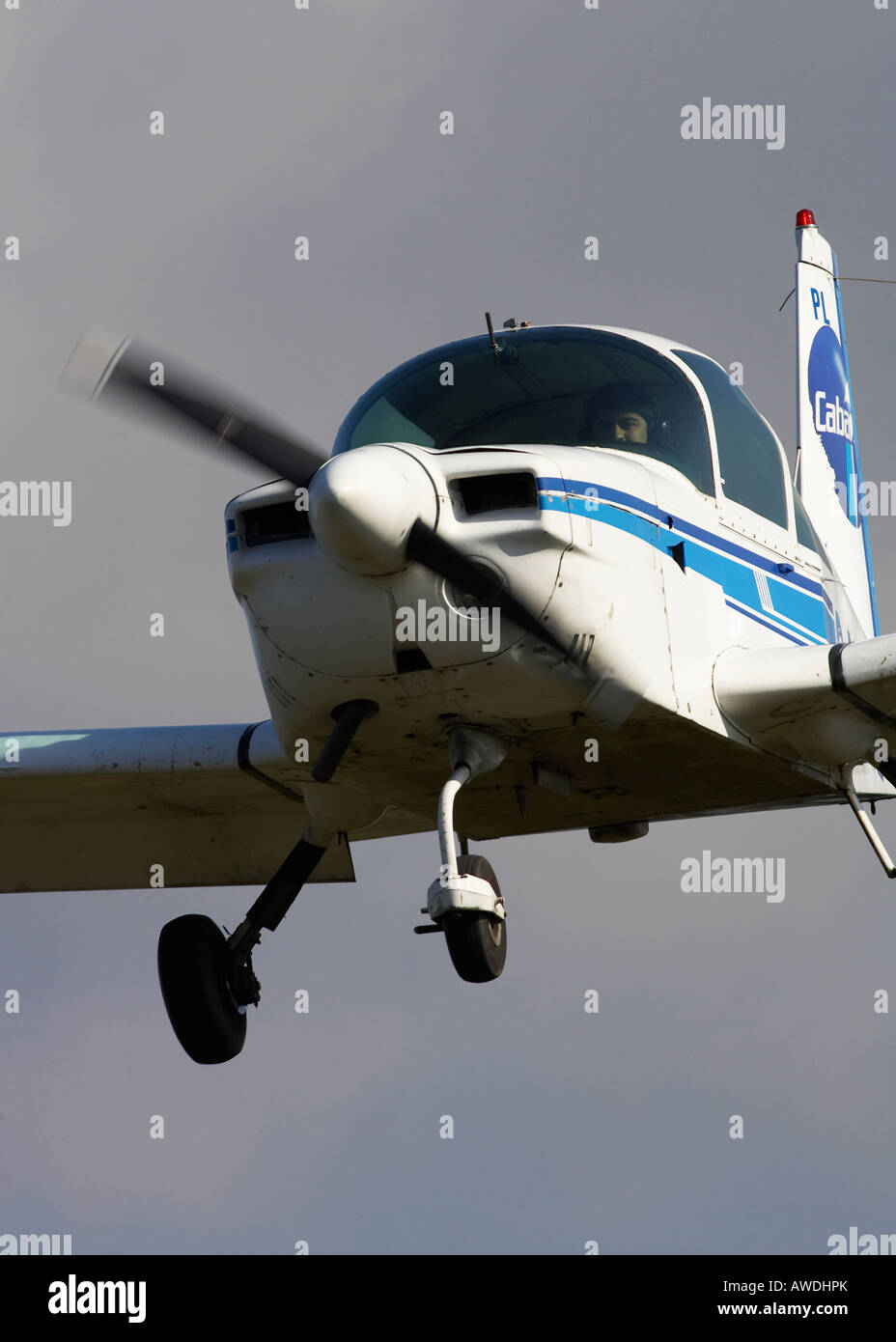 Light aircraft coming in to land Stock Photo - Alamy