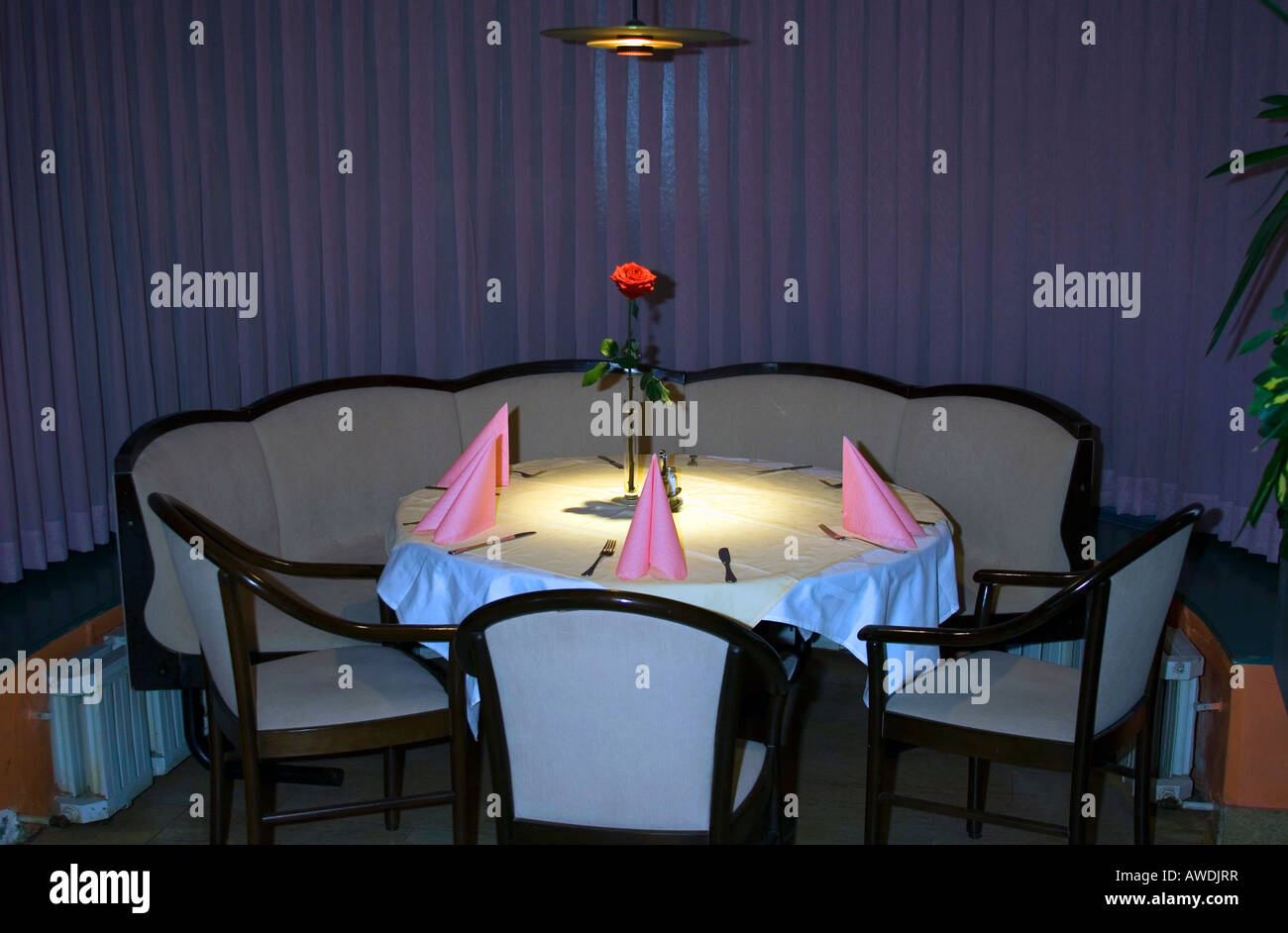 Tables setup for dinner in a hotel Stock Photo - Alamy