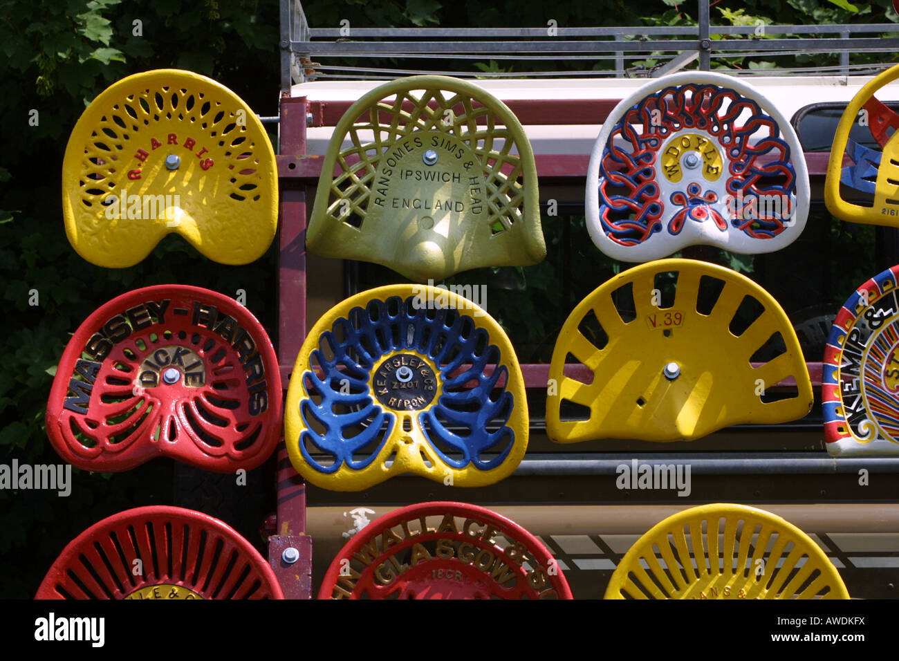 Vintage tractor seat colourful Stock Photo - Alamy