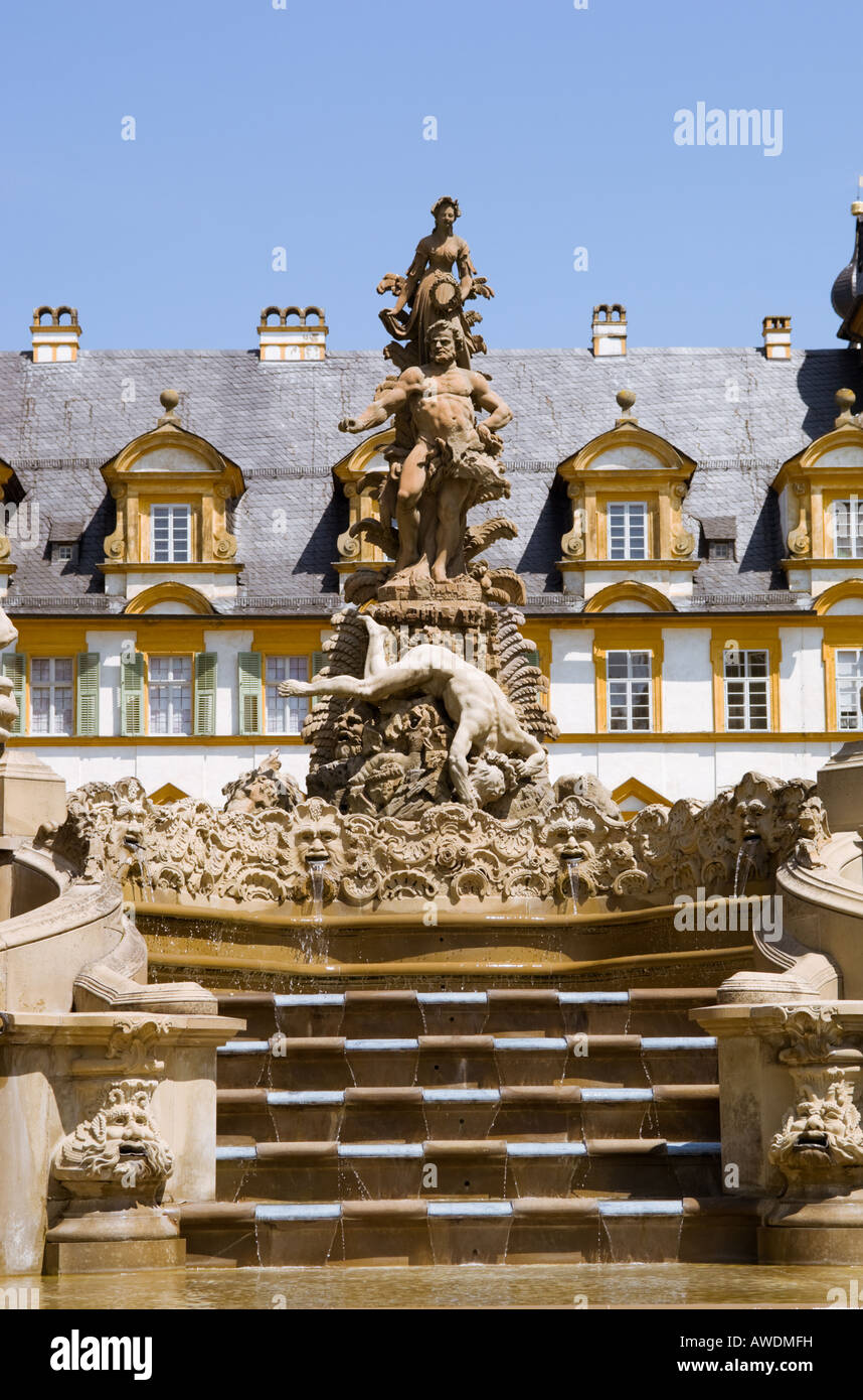 Baroque fountains in front of the impressive Schloss Seehof Palace ...