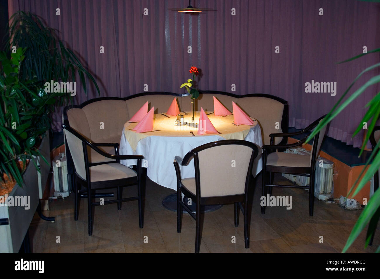 Tables setup for dinner in a hotel Stock Photo - Alamy