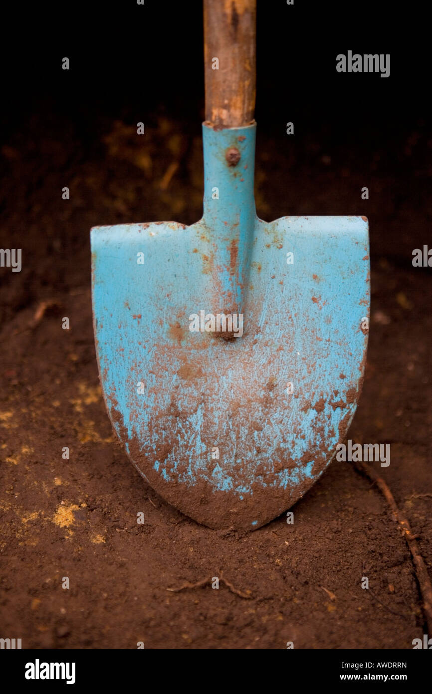 Garden shovel used for digging in a garden Stock Photo - Alamy