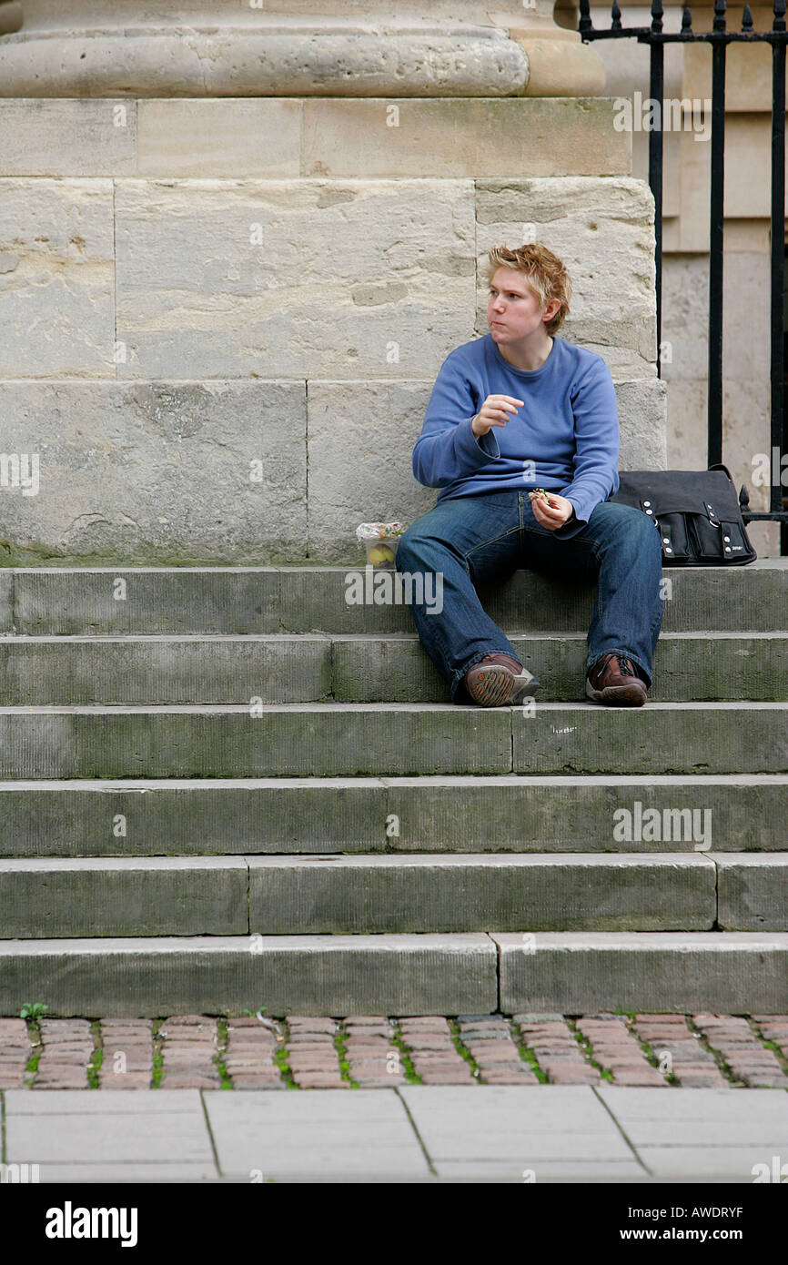 Oxford city centre student have rest relax seat stairs education learn ...