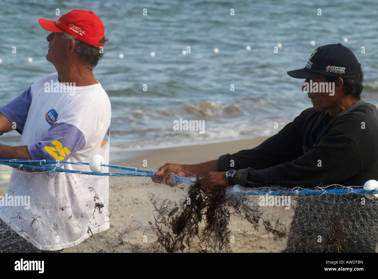 Pulling the net Stock Photo - Alamy
