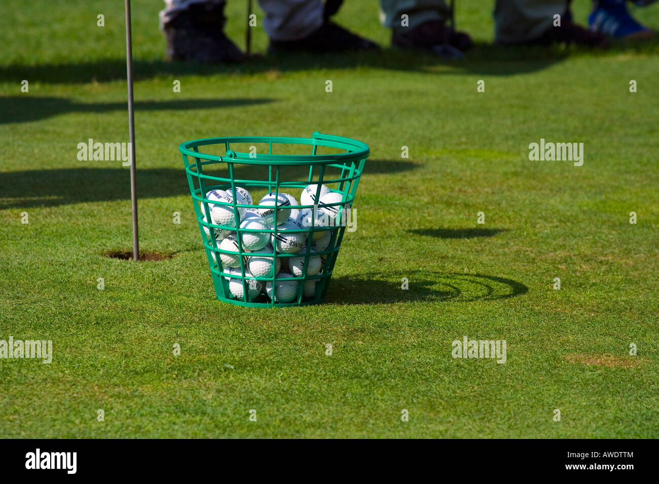 Golf balls in basket hi-res stock photography and images - Alamy