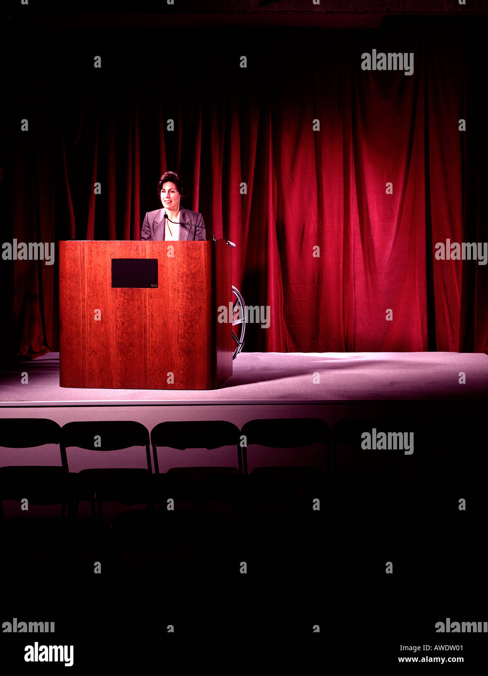 1 one female woman business executive public speaker podium Stock Photo ...