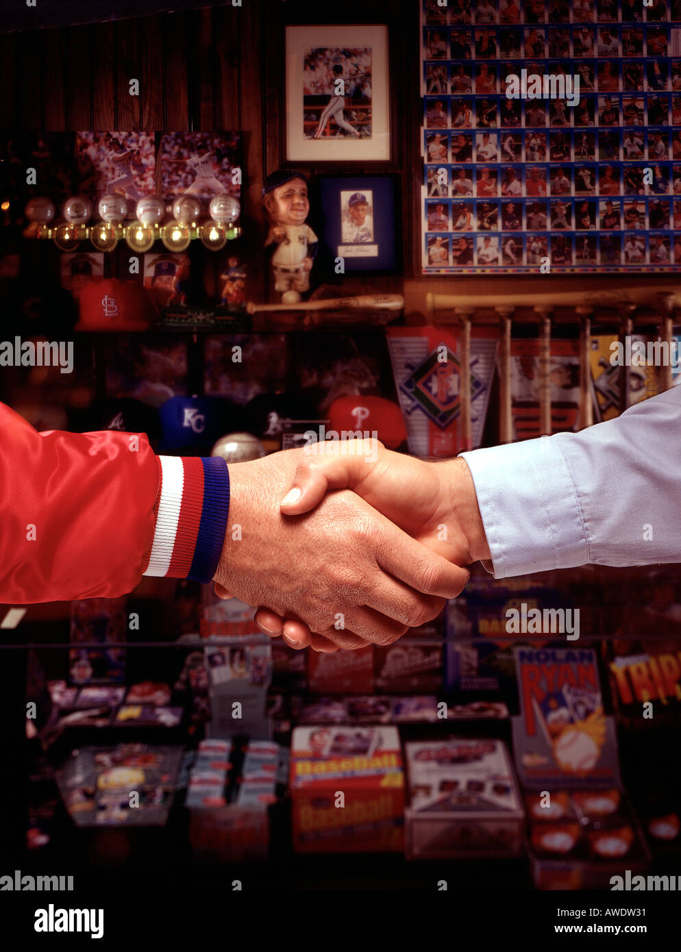 2 two hands shake shaking businessman businessmen sport memorabila ...