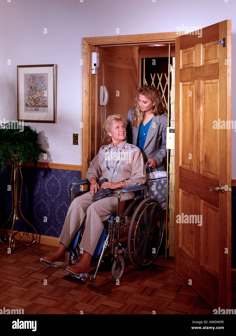 woman wife grandmother exit enters in home elevator lift assisted ...