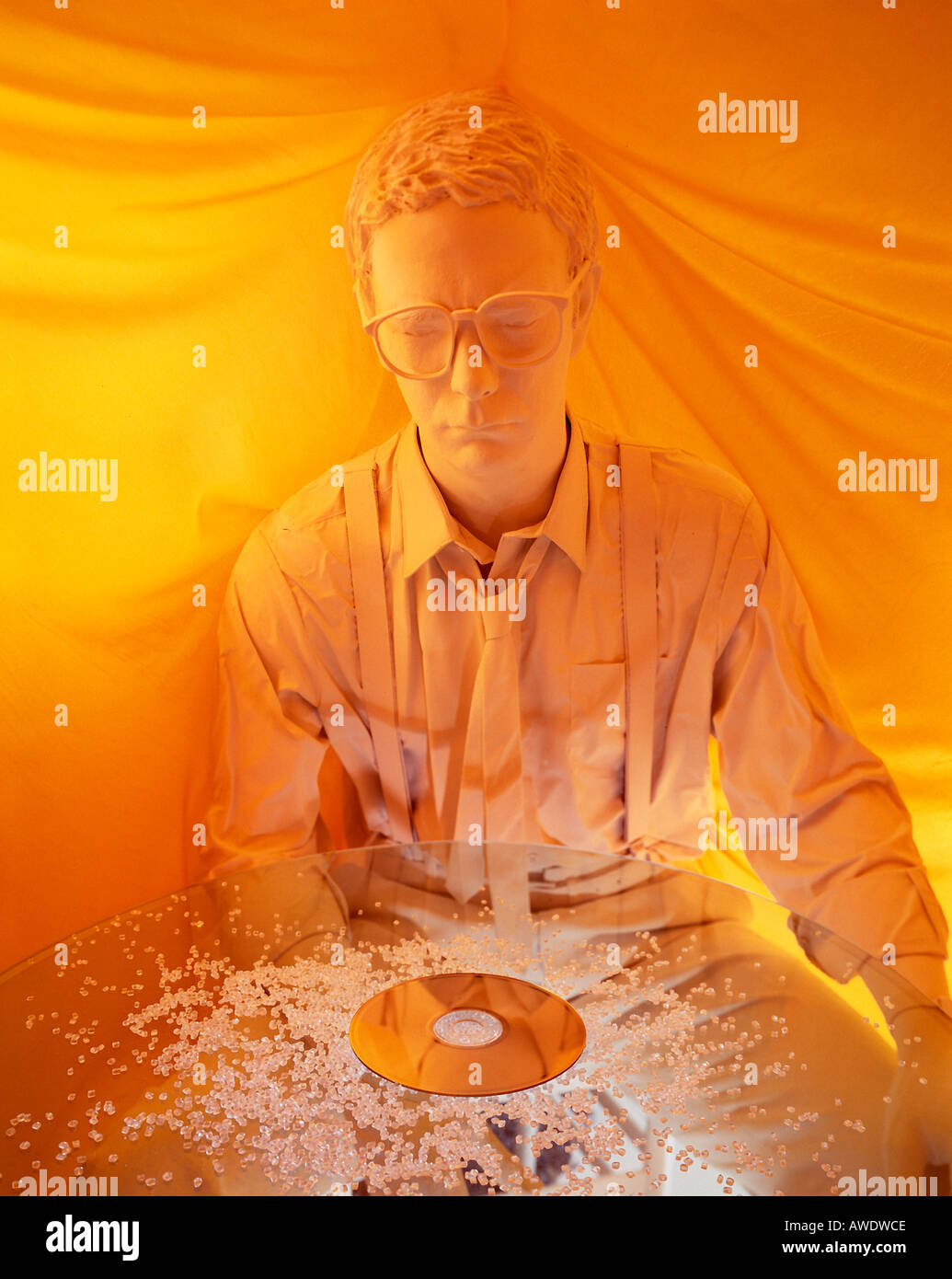 art sculpture businessman seated computer CD design Stock Photo - Alamy