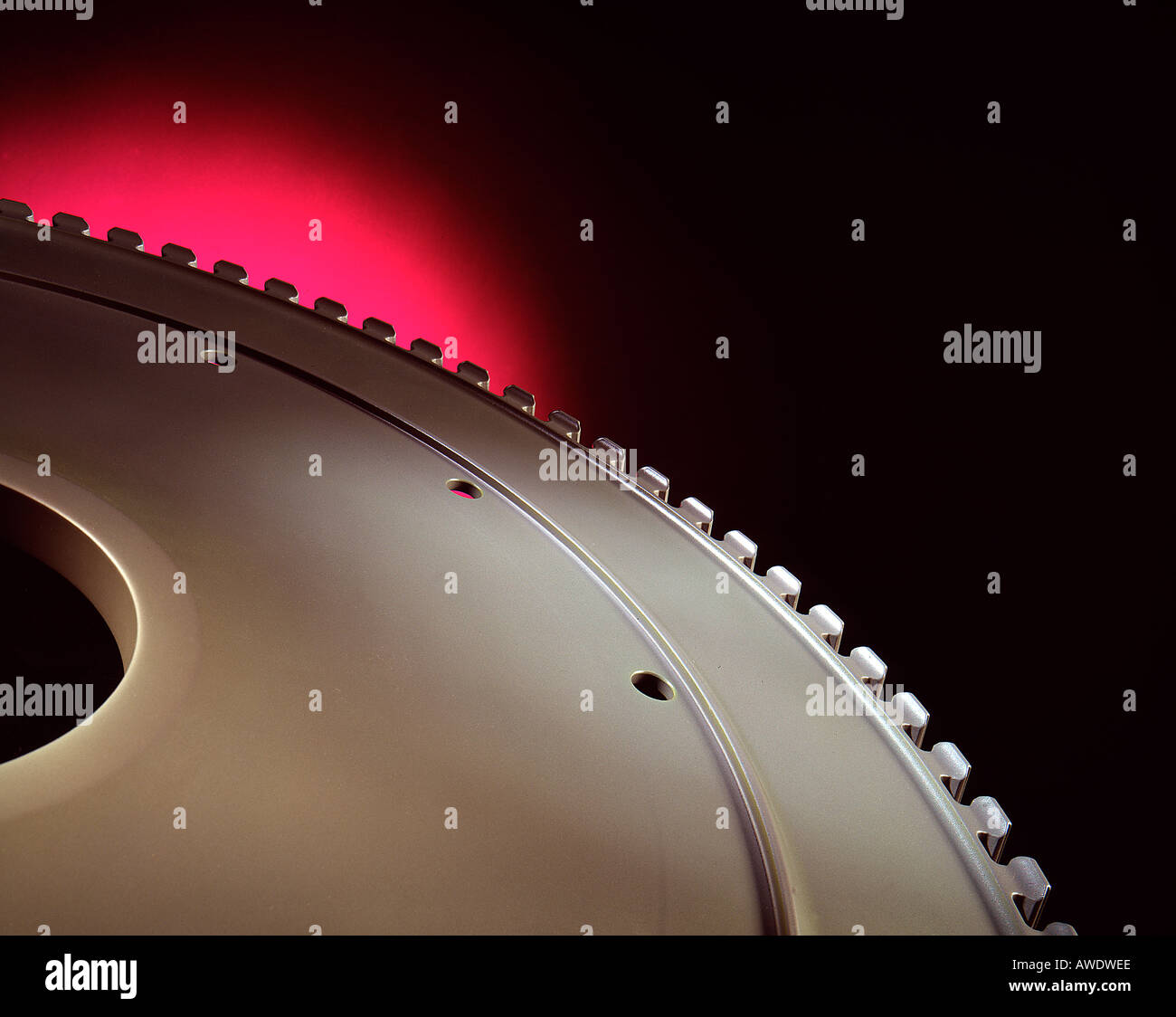 still life close up detail gear teeth glowing color background industry ...