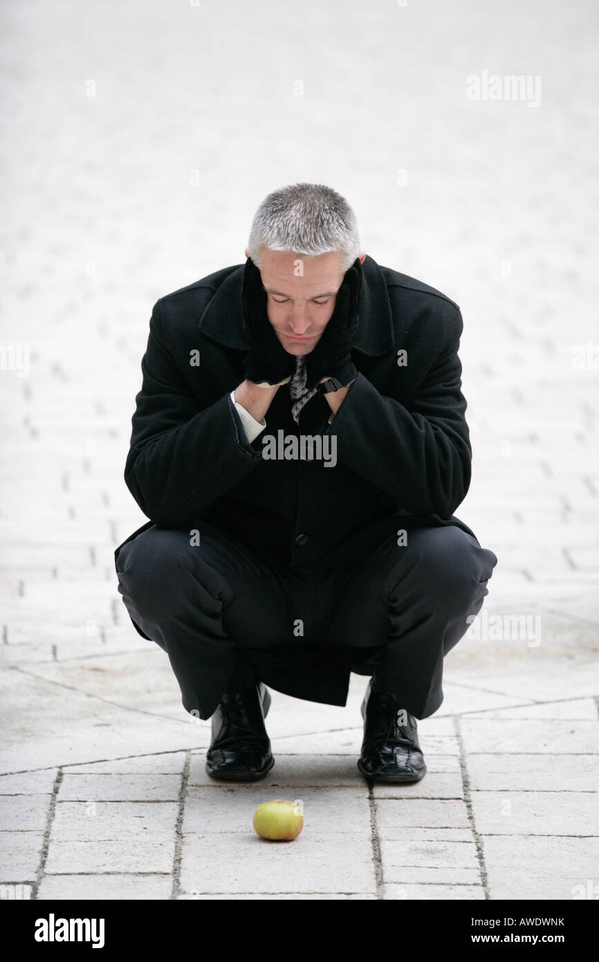 Businessman man crouching squating hi-res stock photography and images ...