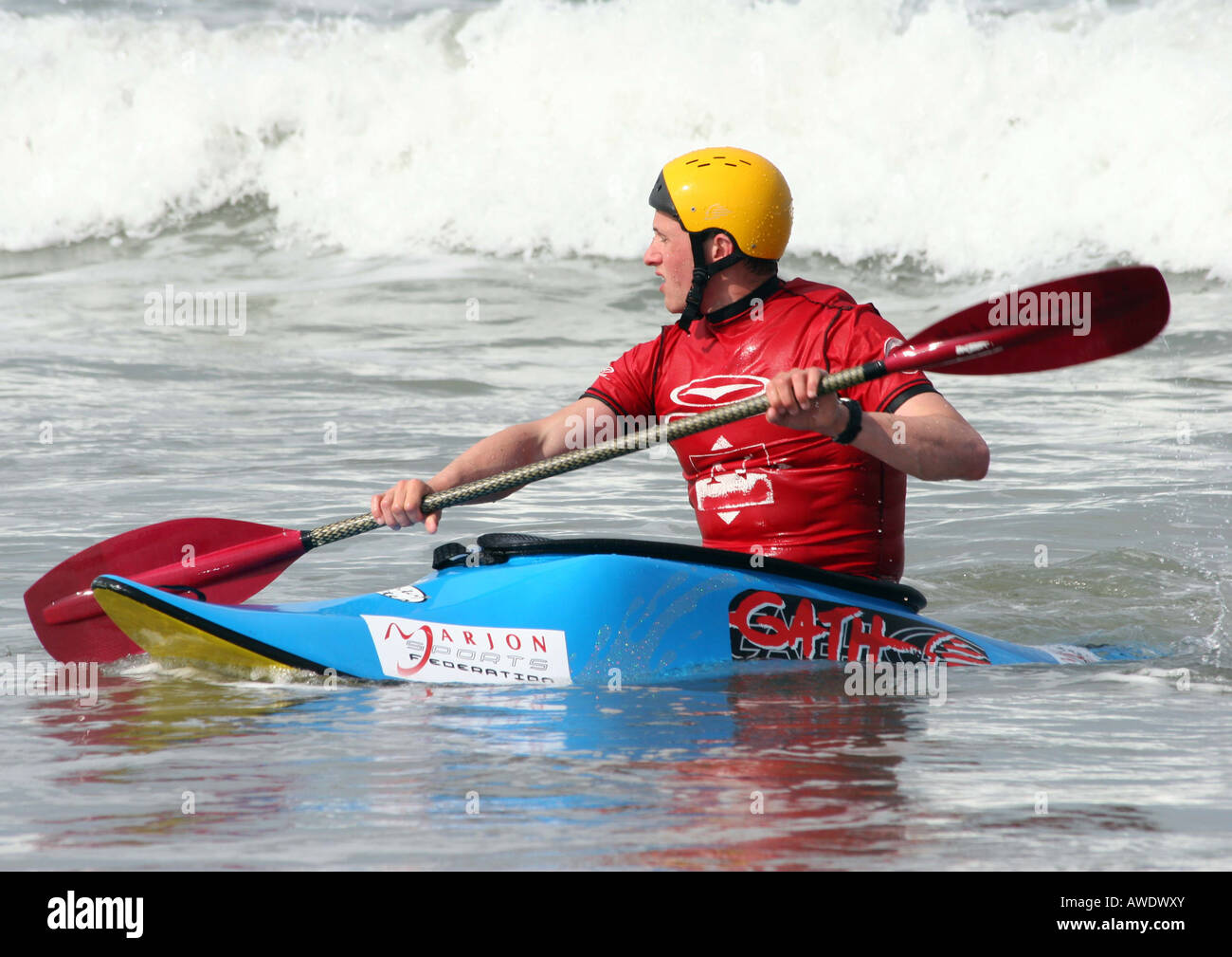 kayak landing on the beach after surfing in Stock Photo - Alamy