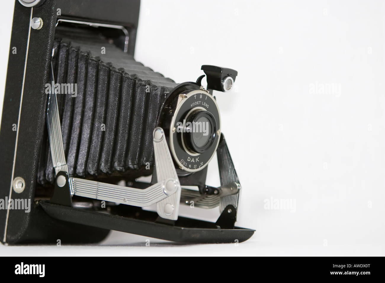 An old style bellows camera against a white background Stock Photo - Alamy