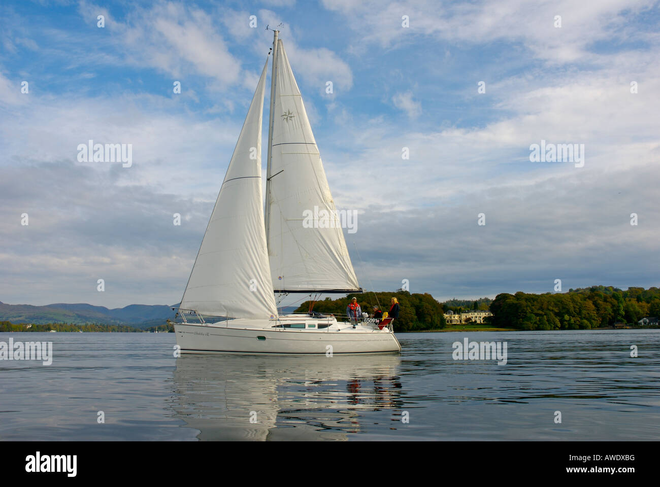 Yacht sailing on Lake Windermere, with Storrs Hall Hotel behind, Lake ...