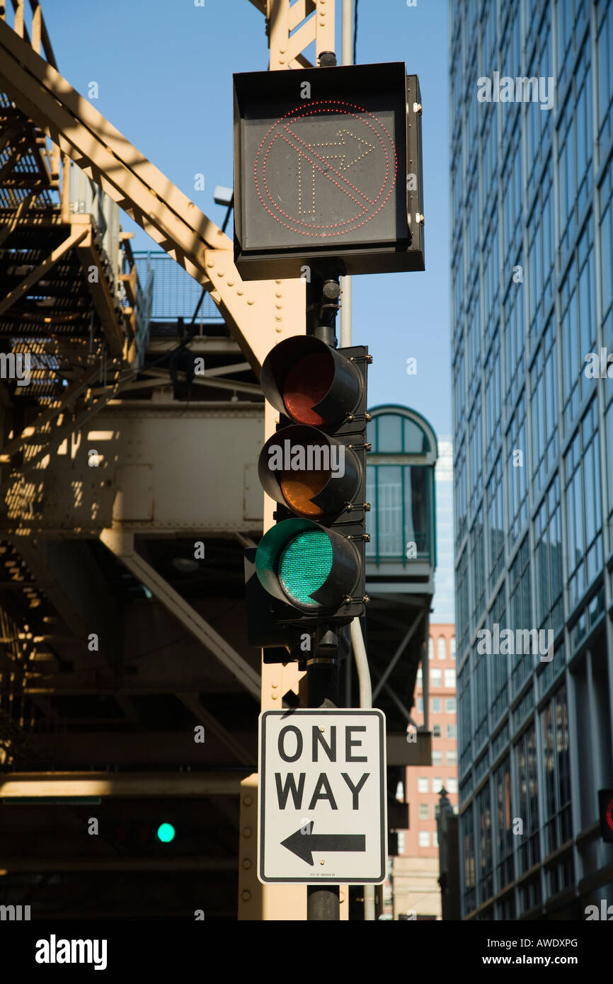 ILLINOIS Chicago One way sign and do not walk signal on traffic light ...