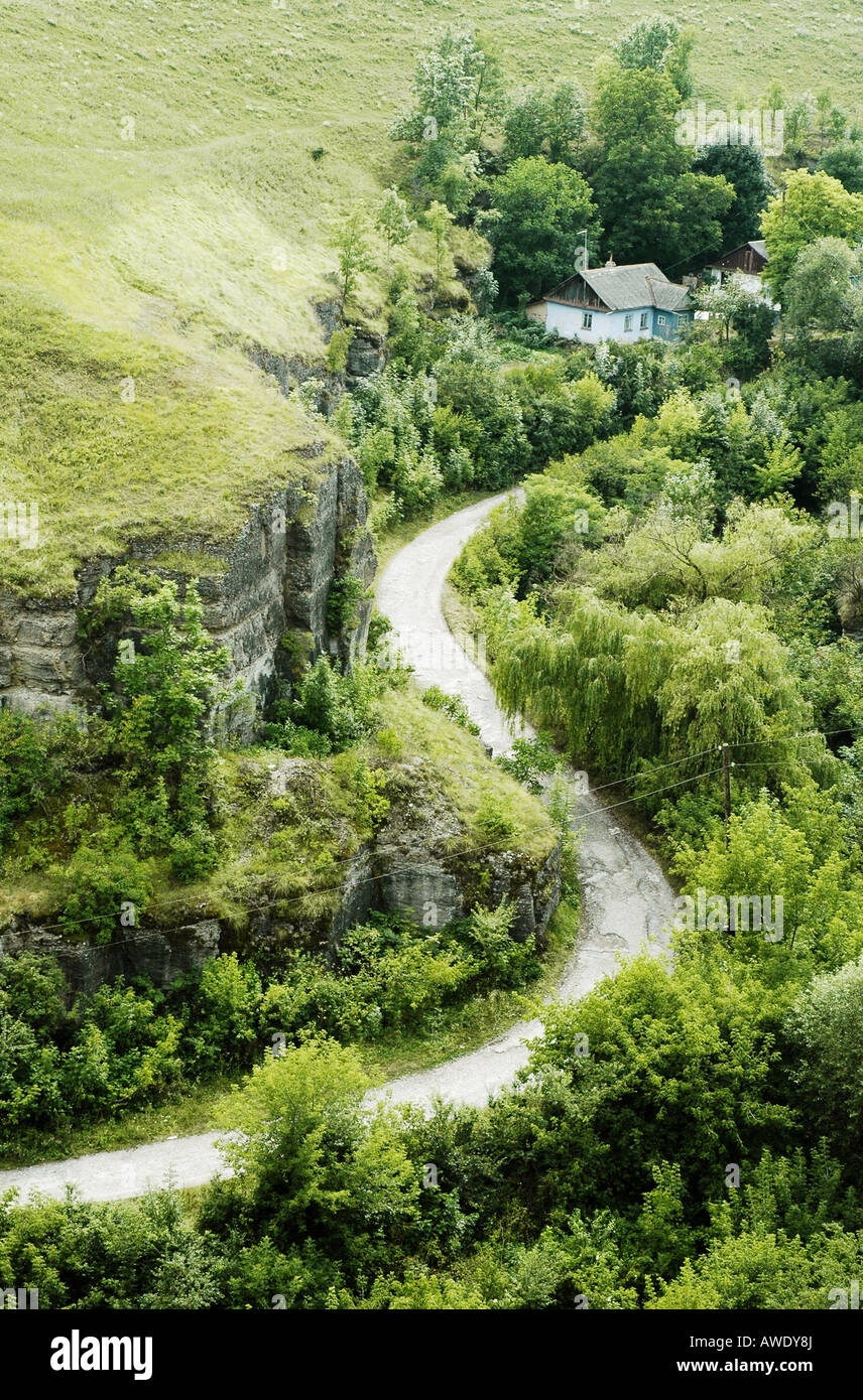 Twisting road to home Stock Photo - Alamy