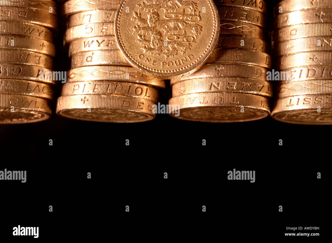 generic of shiny british pound coins balancing in the recession Stock ...