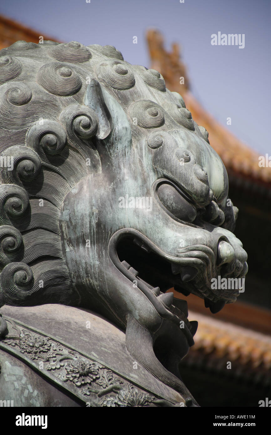 An Imperial Guardian Lion, a mythic protector, stands guard at a temple ...