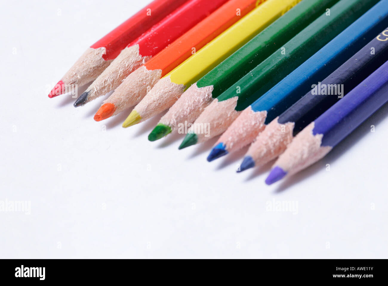Eight pencil crayons and a pencil lie together Stock Photo - Alamy