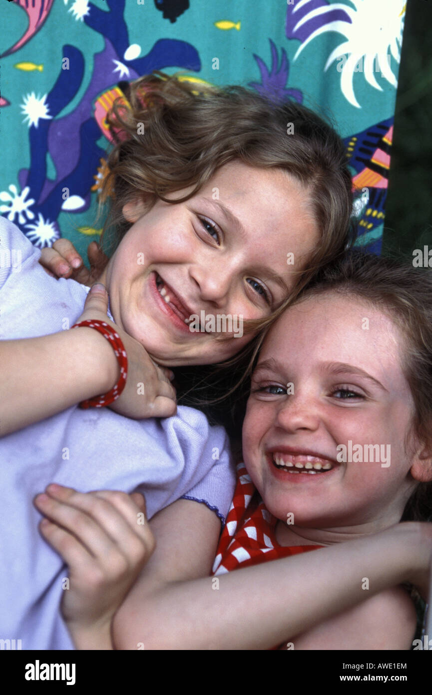 Two young friends having a good time together Stock Photo - Alamy