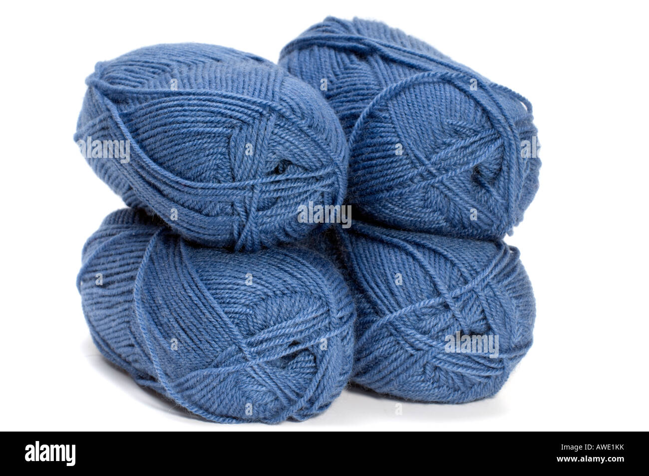Four balls of blue wool Stock Photo - Alamy