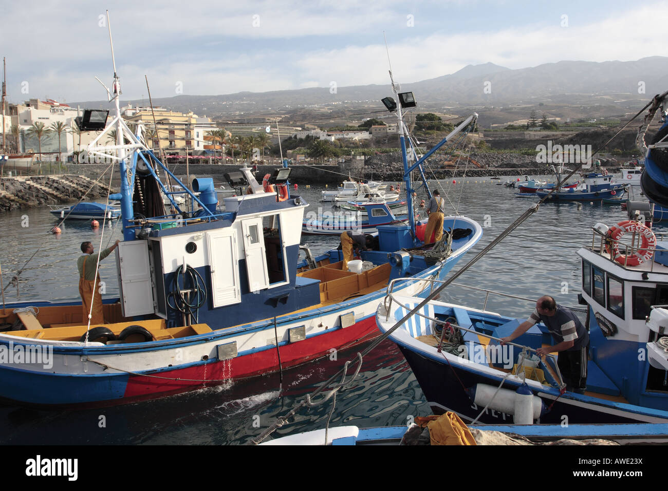 Fishing boats mooring after unloading at Playa San Juan Tenerife Canary ... Fishing boats mooring after unloading at Playa San Juan Tenerife Canary ...