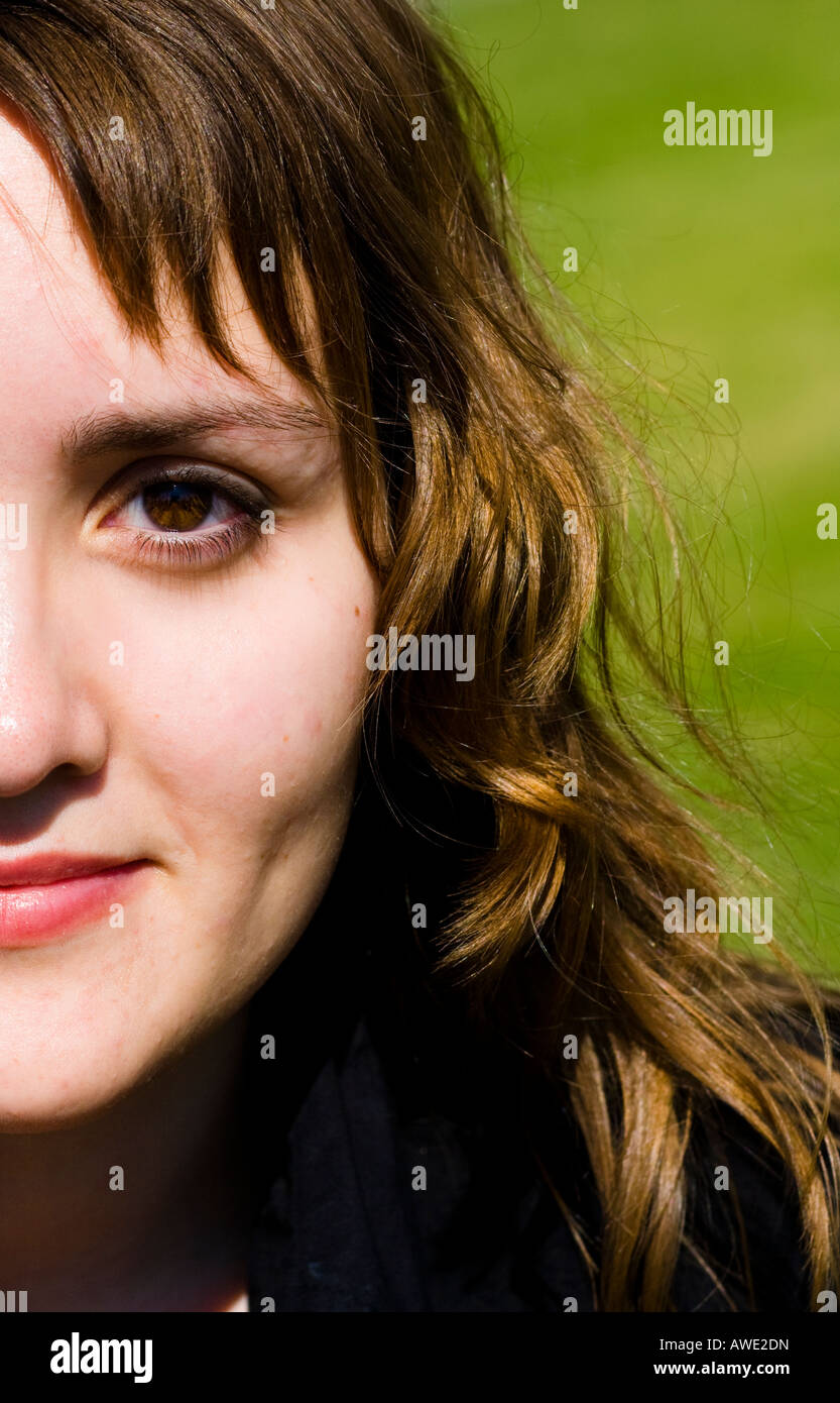Half full smiling blonde woman portrait Stock Photo - Alamy