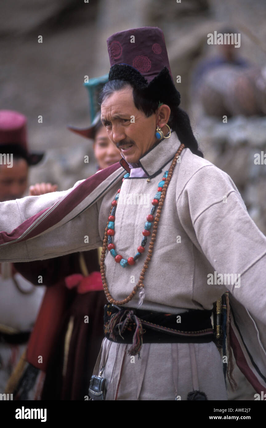 Man performing a traditional dance wearing traditional costume, Ladakh ...
