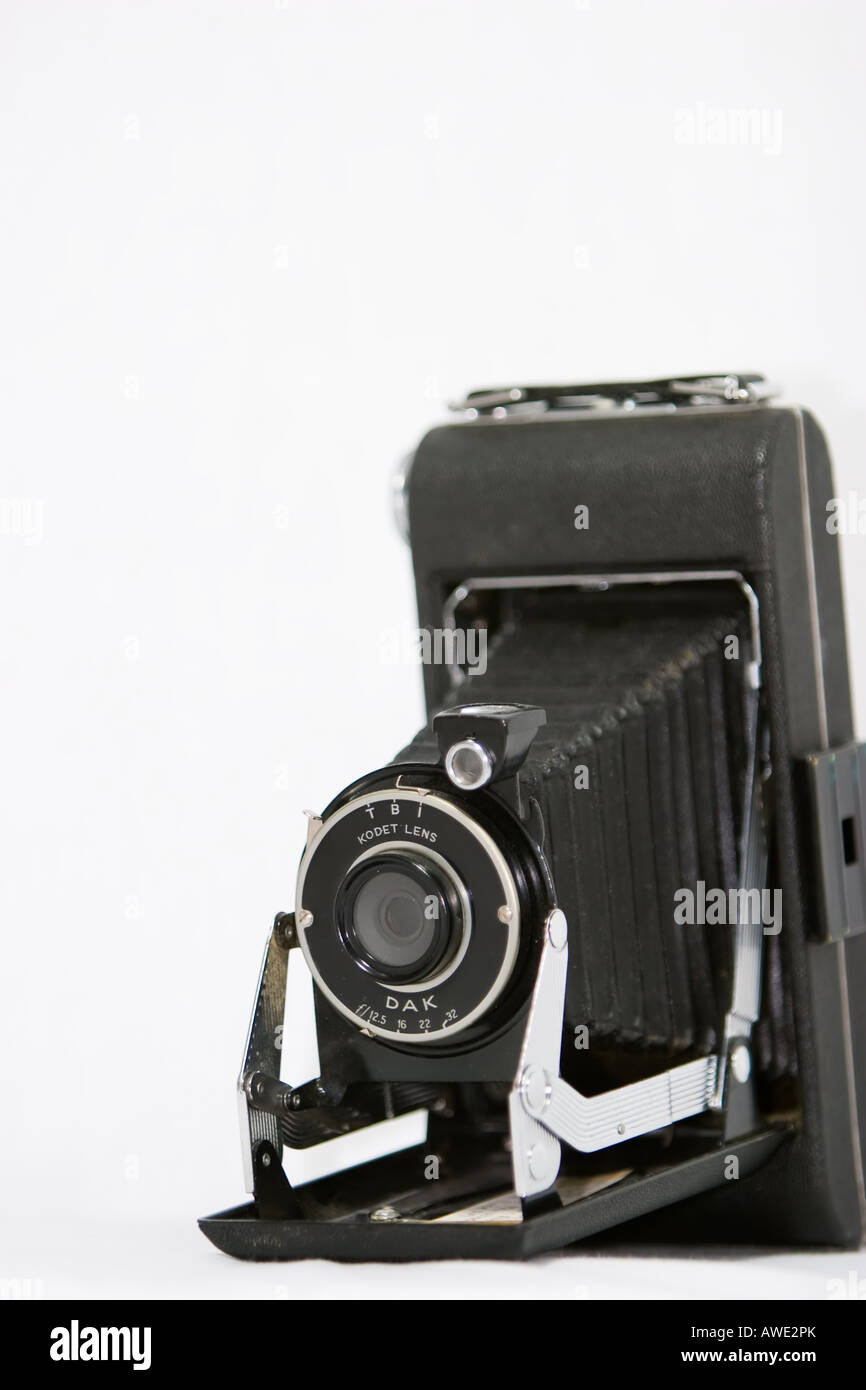 An old style bellows camera against a white background Stock Photo - Alamy