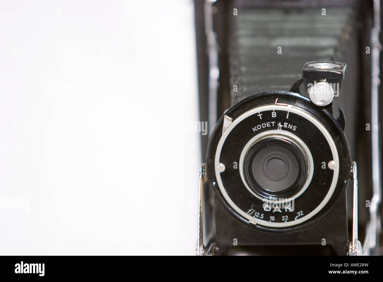 An old style bellows camera against a white background Stock Photo - Alamy