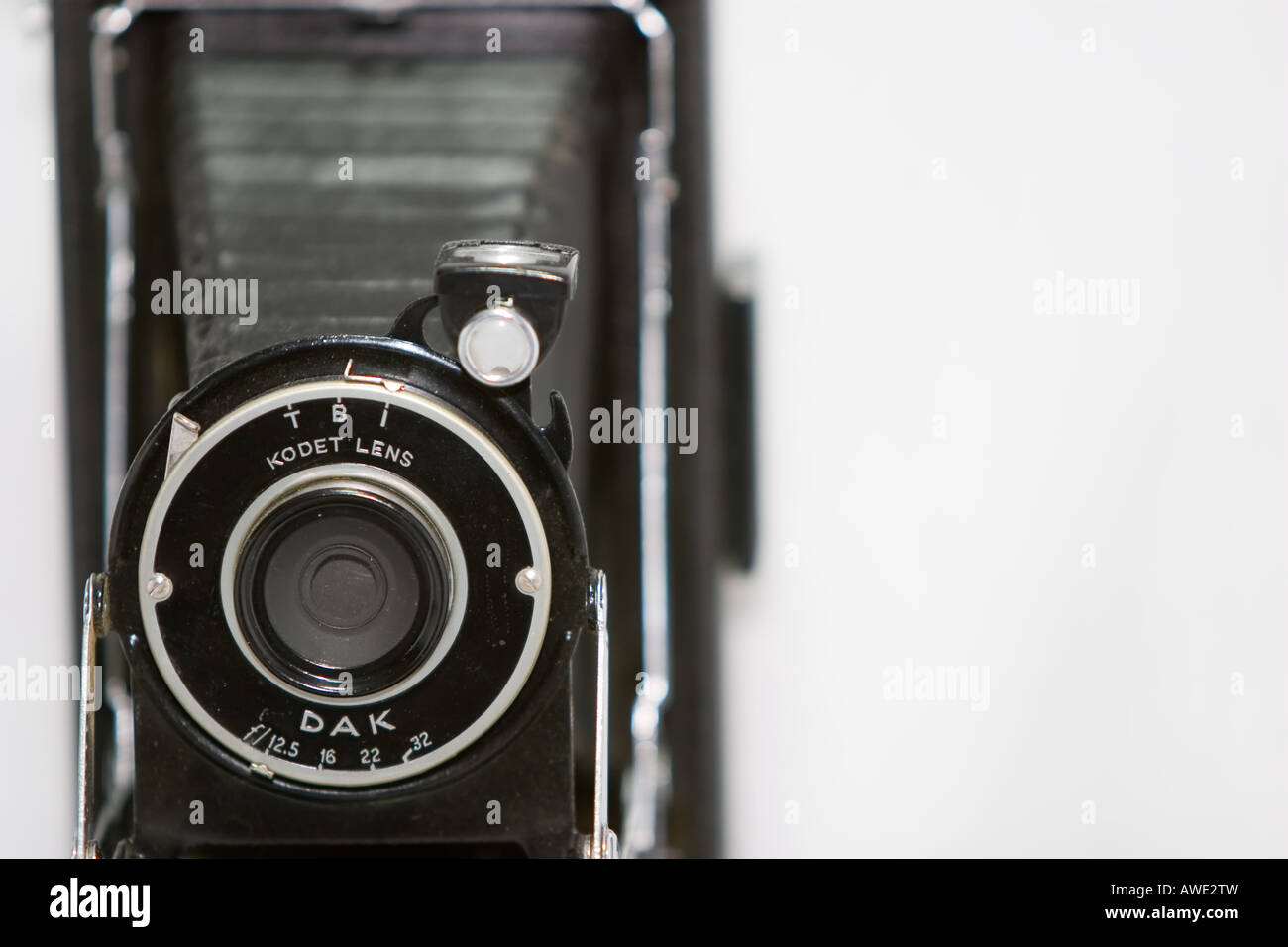 An old style bellows camera against a white background Stock Photo - Alamy
