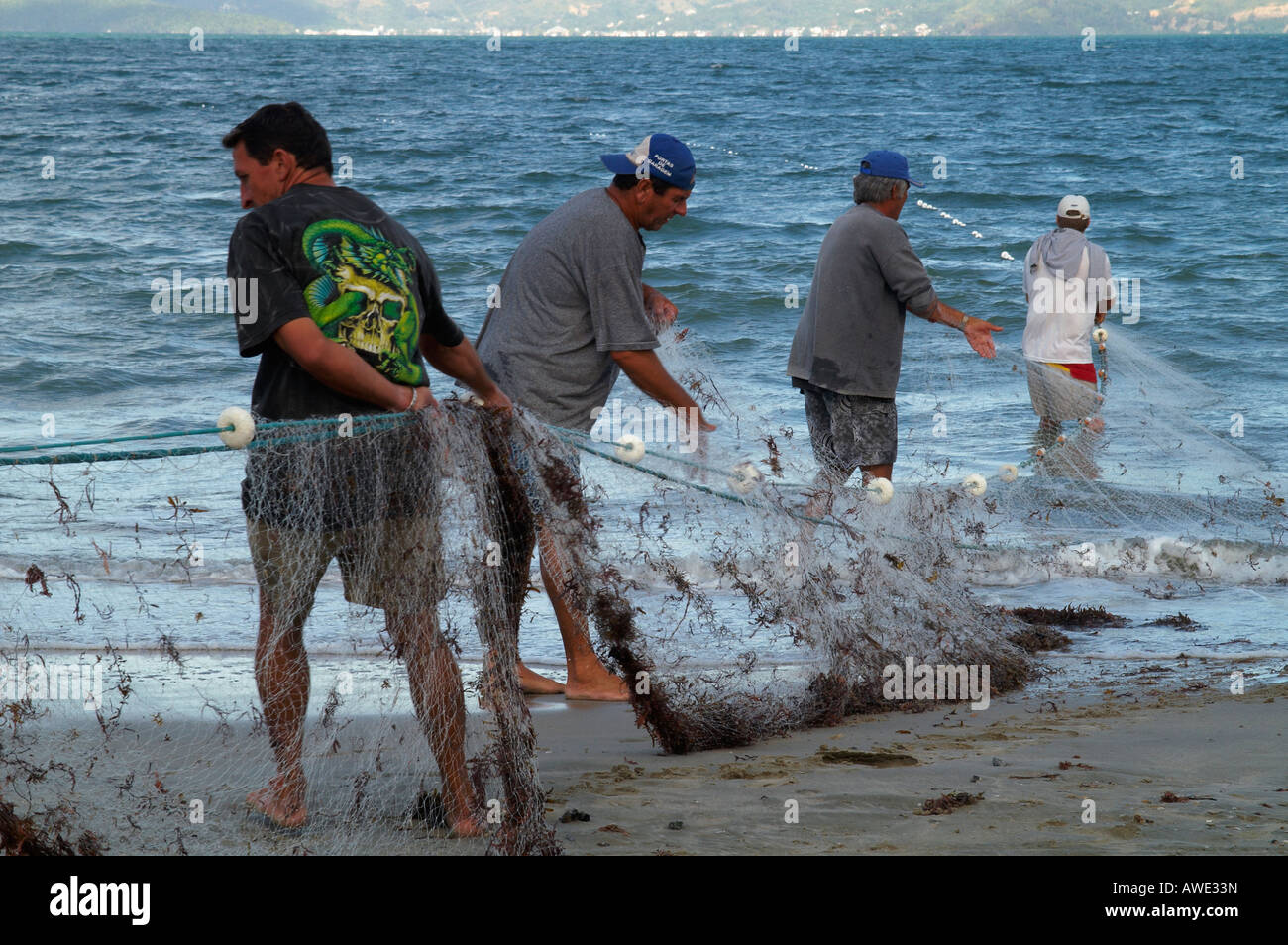 Pulling the net Stock Photo - Alamy