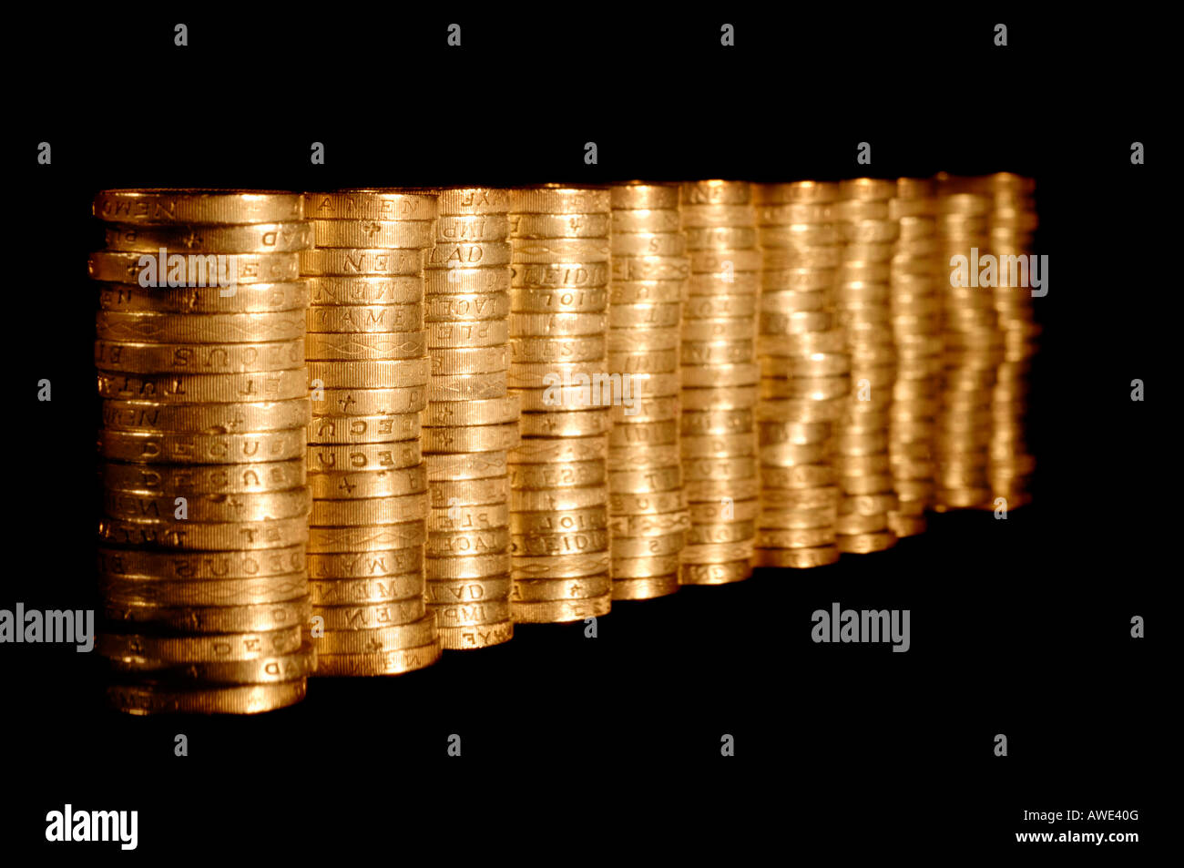 generic of shiny british pound coins balancing in the recession Stock ...