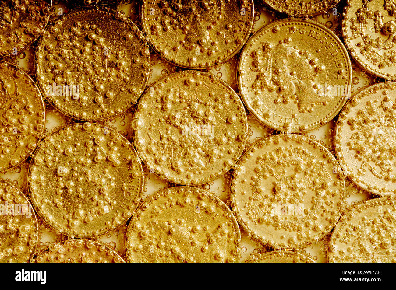 generic of shiny british pound coins underwater Stock Photo - Alamy