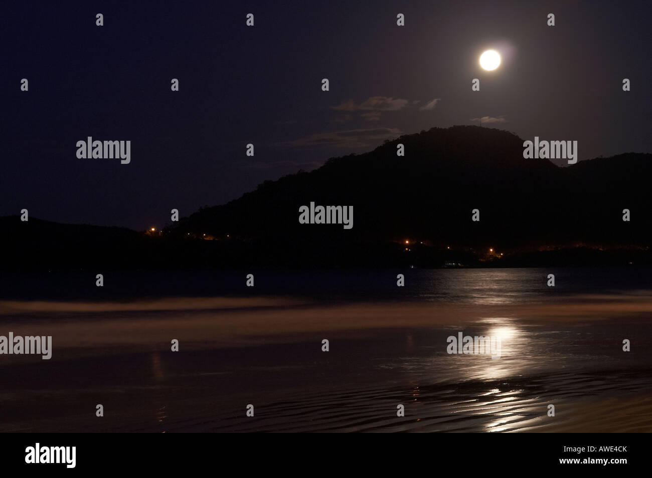 Full moon over the beach Stock Photo - Alamy