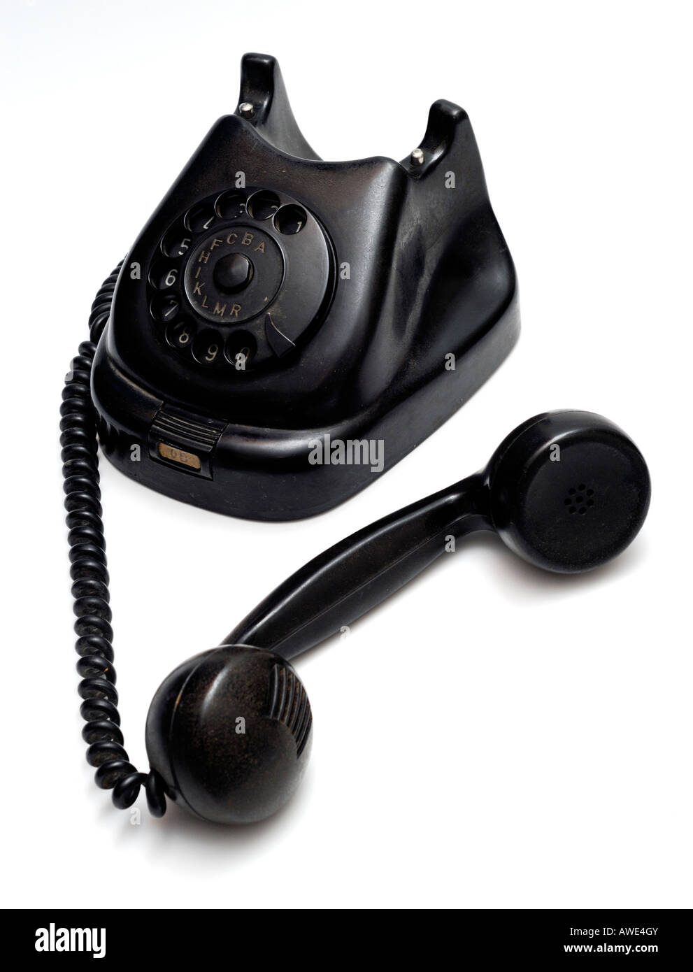 black old vintage phone with hand set off hooks dial showing number and ...